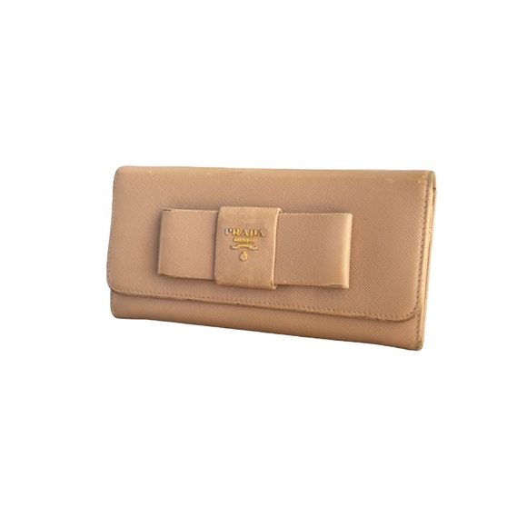 Prada | Bags | Prada Gold Pink Bow Tie Wallet In Saffiano Leather ...